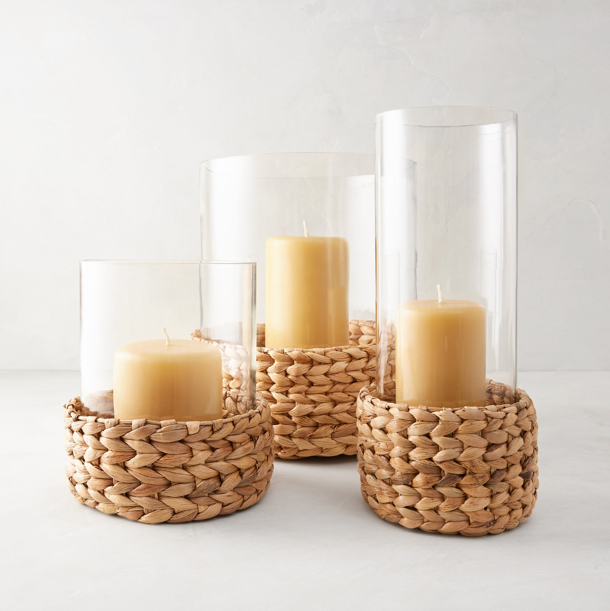 Small Glass Hurricane with Woven Hyacinth Base - Hudson Grace